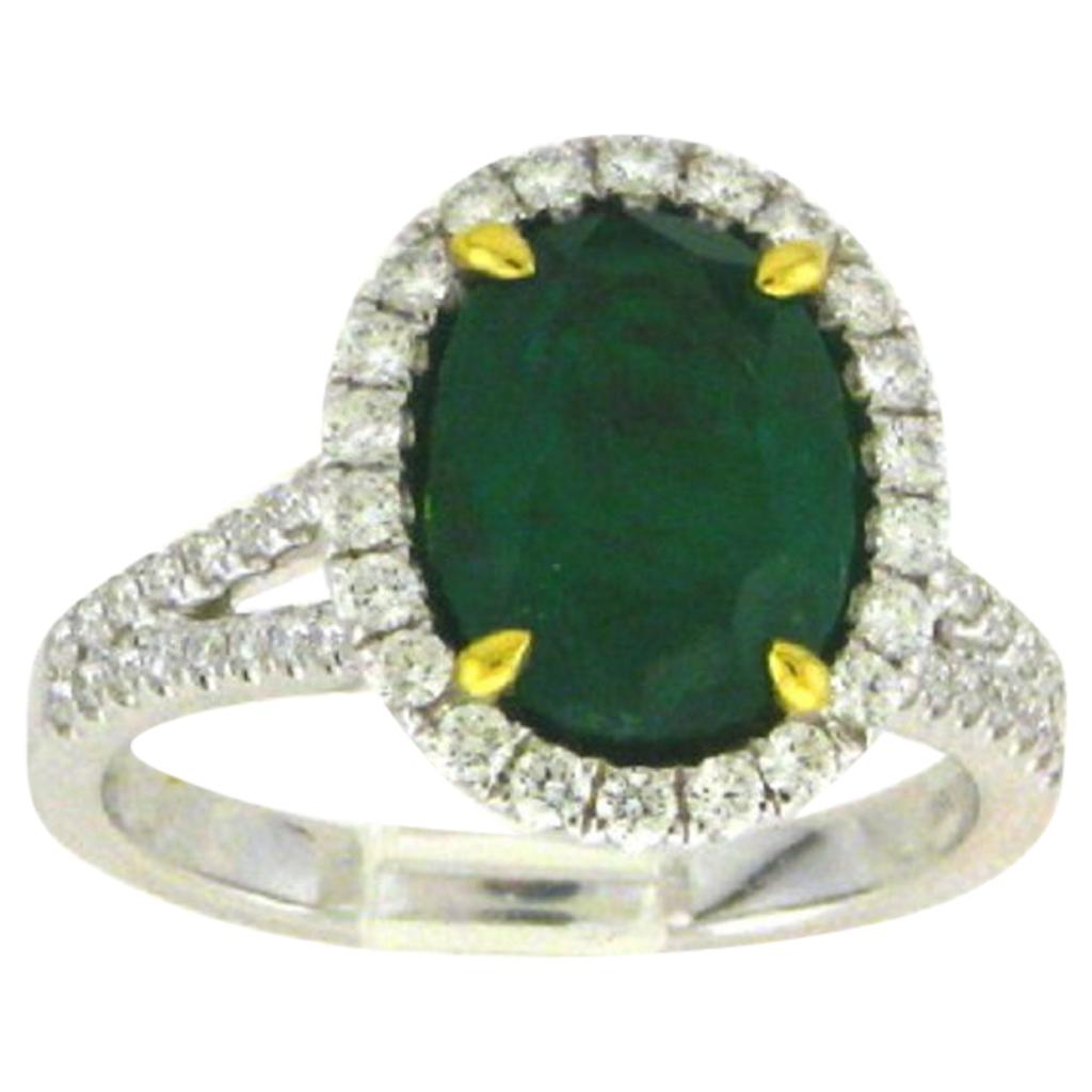 18 Karat White Gold Emerald Cut Emerald and Diamond Ring at 1stDibs