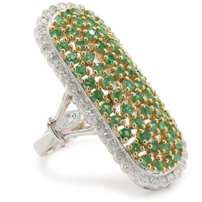 18 Karat White And Yellow Gold Elongated Oval Emerald And Diamond Ring