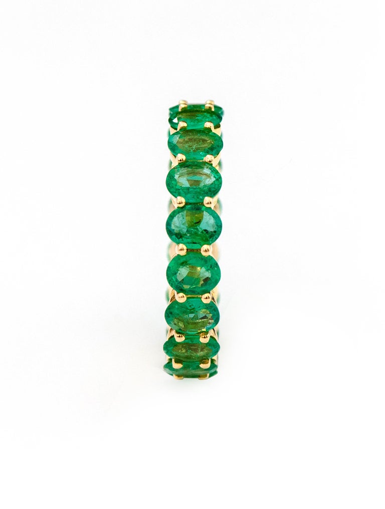 18 Karat Yellow Gold 40 Pointers Oval-Cut Natural Emerald Eternity Band ...
