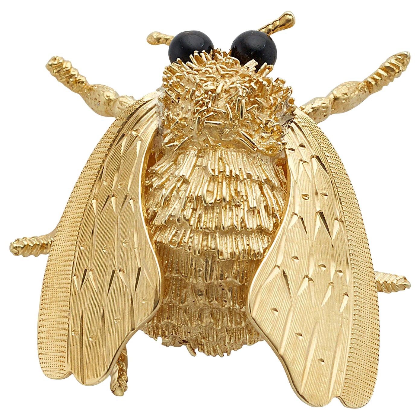 18 Karat Yellow Gold and Onyx Cellino Fly Pin For Sale at 1stDibs