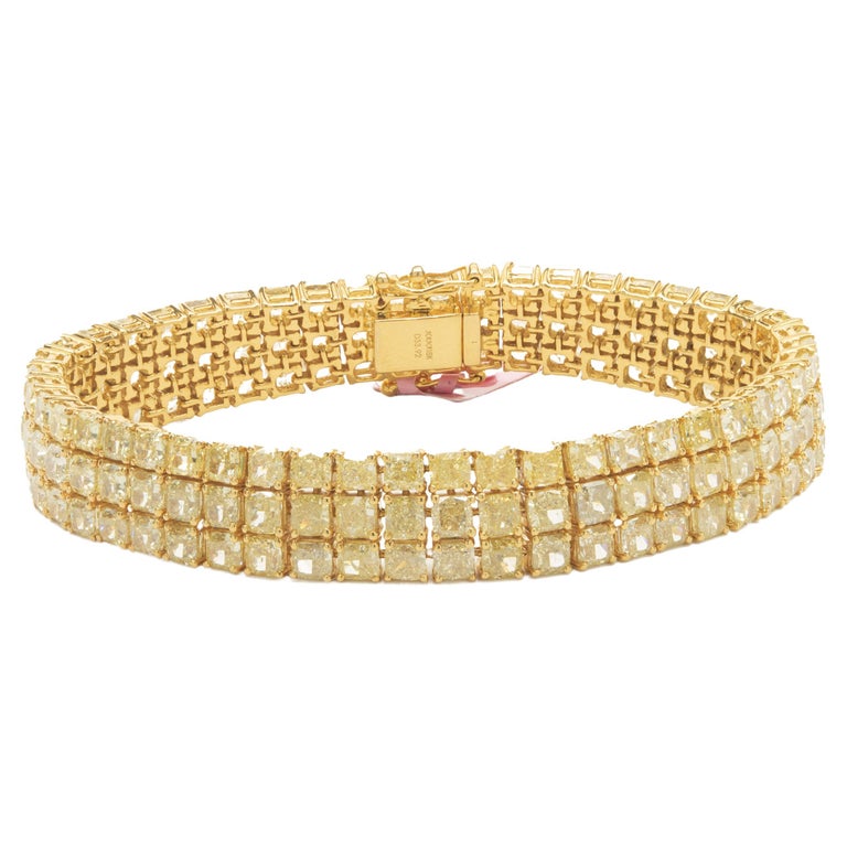 18 Karat Yellow Gold Cushion Cut Fancy Intense Yellow Diamond Three Row ...