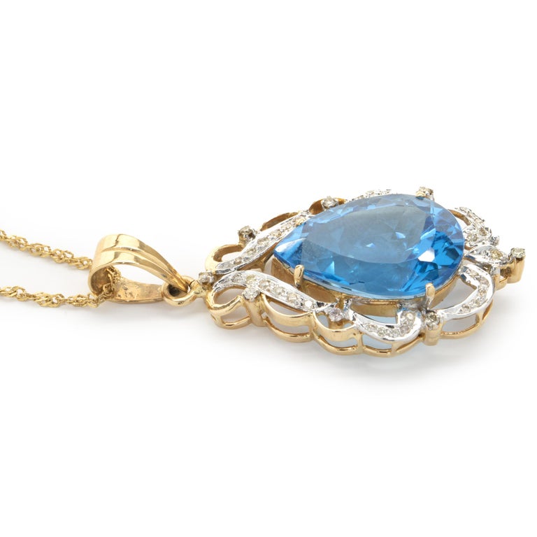 18 Karat Yellow Gold Pear Cut Blue Topaz and Diamond Freeform Pendant ...