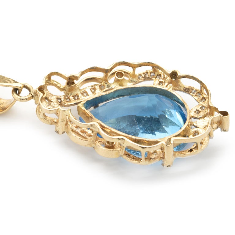 18 Karat Yellow Gold Pear Cut Blue Topaz and Diamond Freeform Pendant ...
