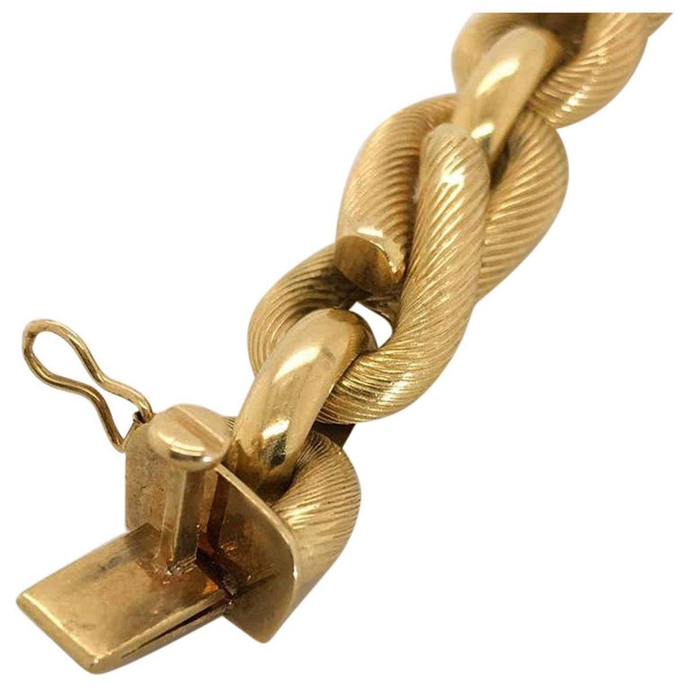 18 Karat Yellow Gold Ribbed Infinity Link Chain Bracelet at 1stDibs