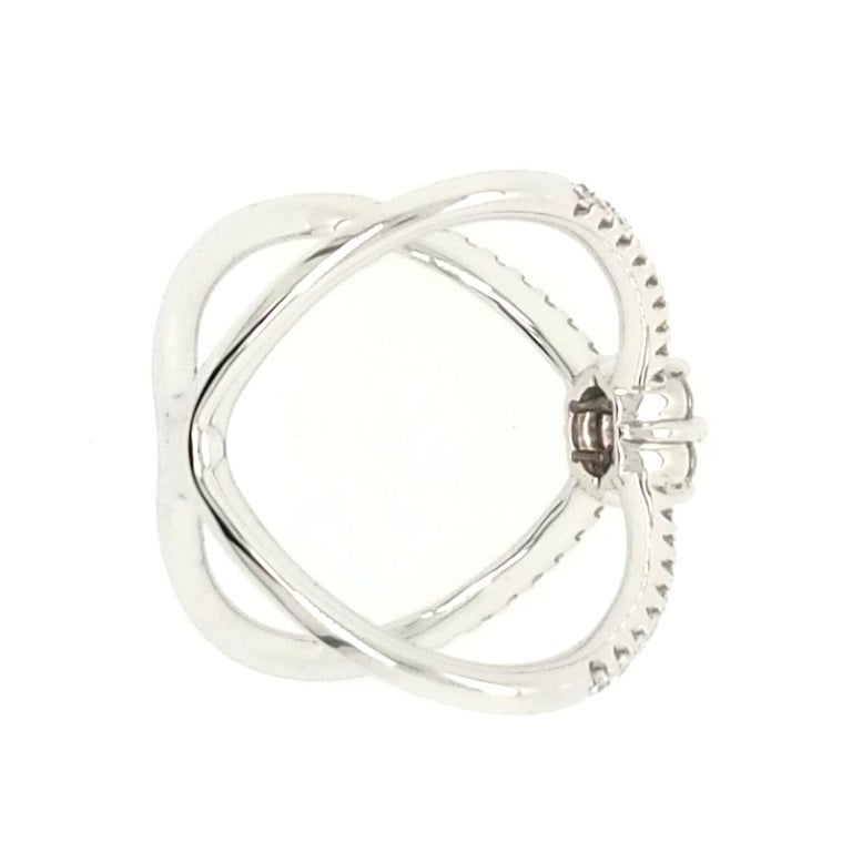 18 Karat Diamond 'X' Negative Space Ring with a Cluster Center White ...