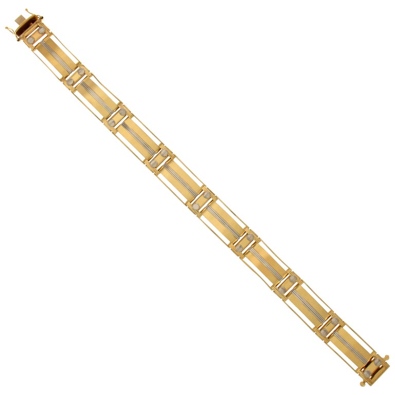 18k gold bracelet with unique design and screws at 1stDibs