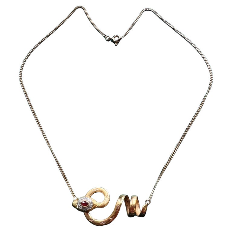18K gold diamond ruby twisted snake necklace For Sale at 1stDibs