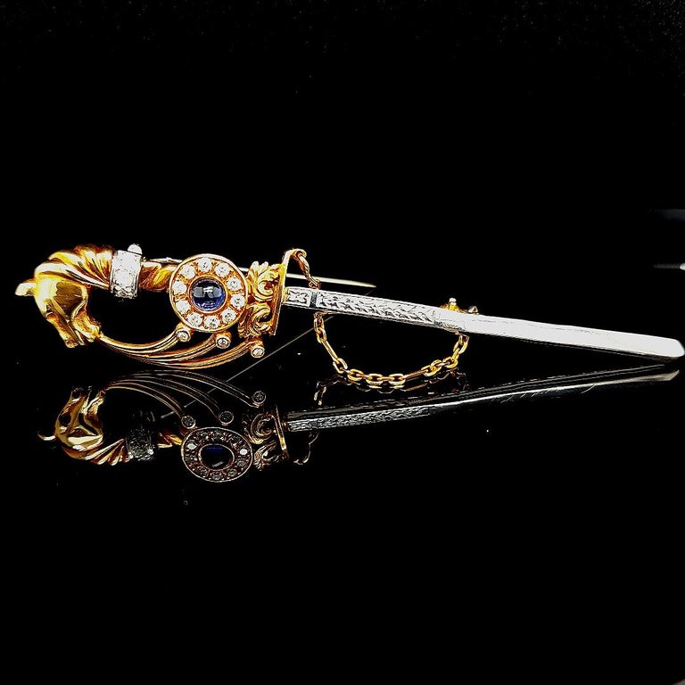 18kt Yellow and White Gold Sword Horse Hilt with Diamonds and Sapphire ...