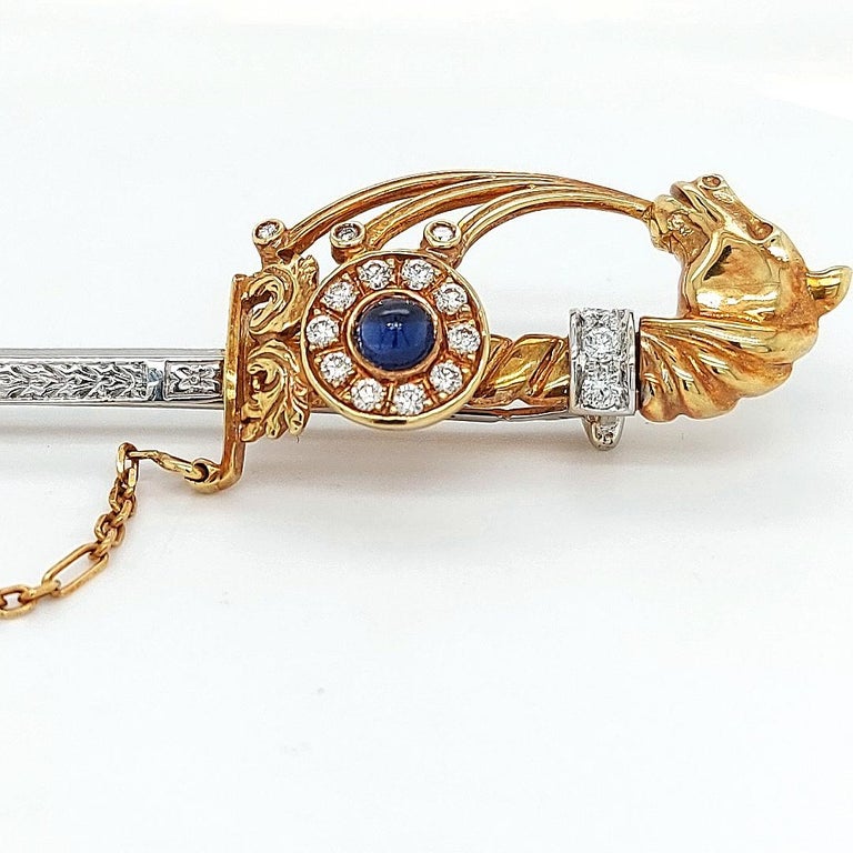 18kt Yellow and White Gold Sword Horse Hilt with Diamonds and Sapphire ...