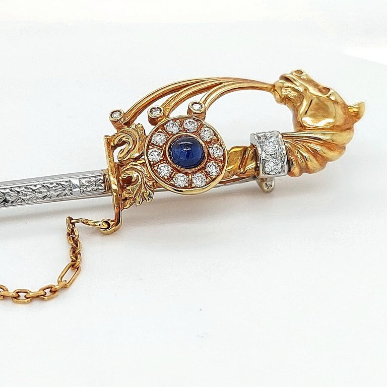 18kt Yellow and White Gold Sword Horse Hilt with Diamonds and Sapphire ...
