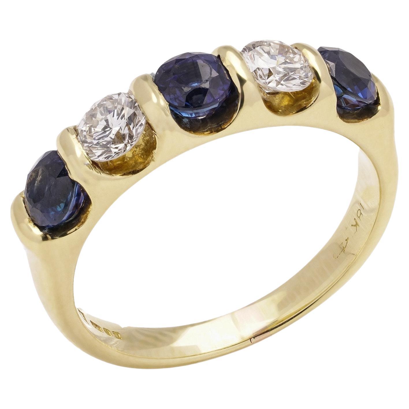 18kt. yellow gold band ring set with 1.30 cts. of round brilliant ...