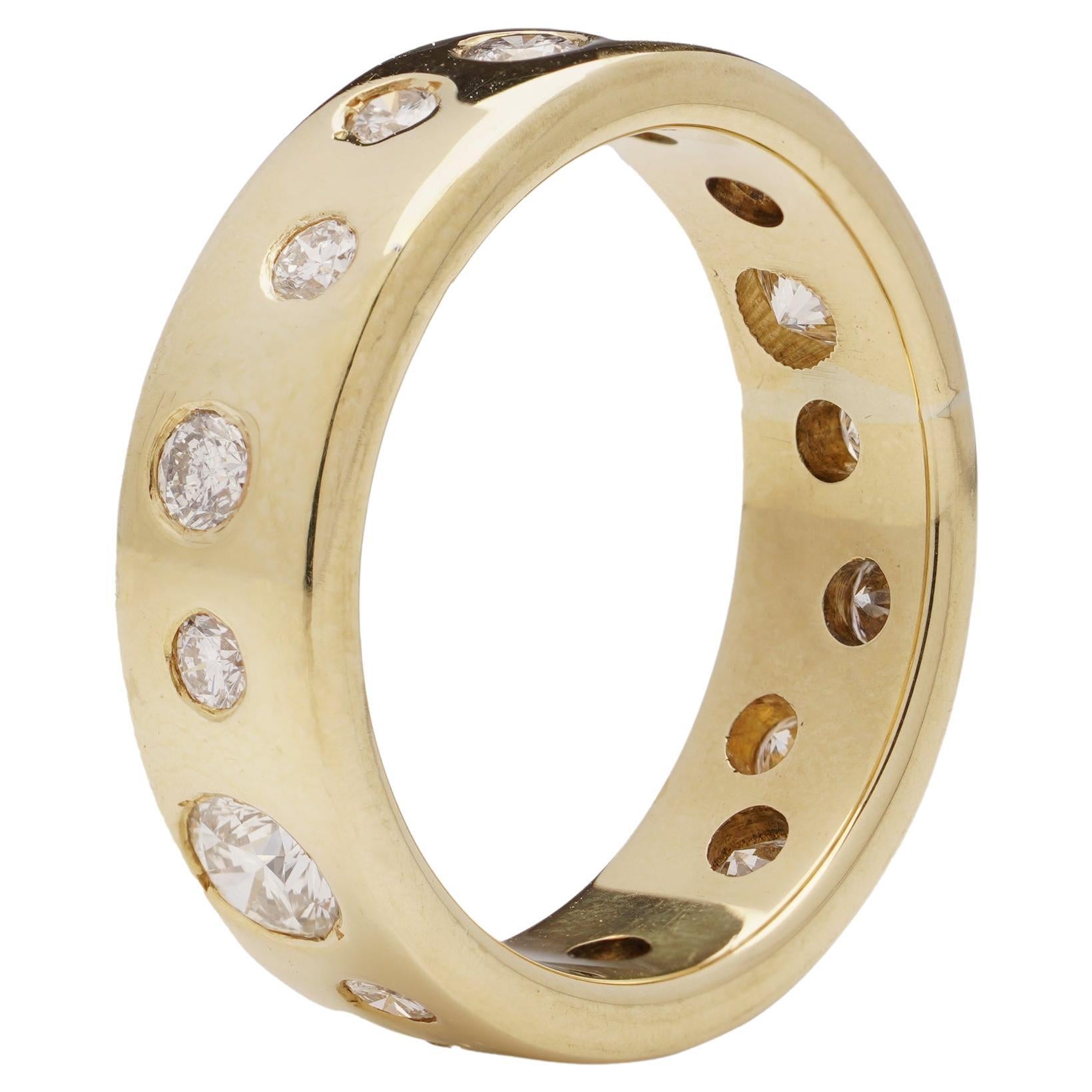 18kt. yellow gold band ring set with 1.30 cts. of round brilliant ...