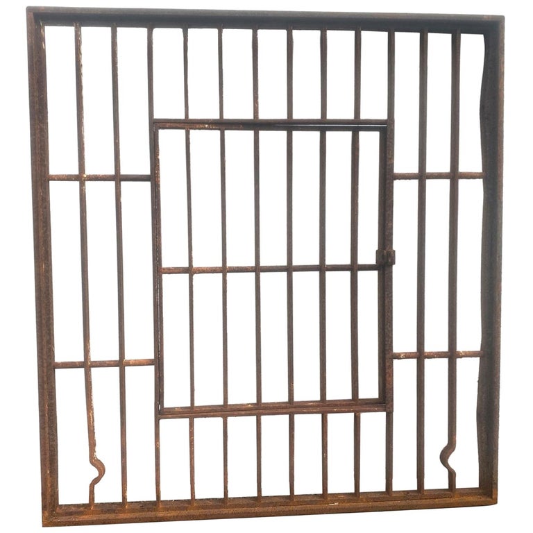 1910 Iron Jail Window with Single Door Opening at 1stDibs