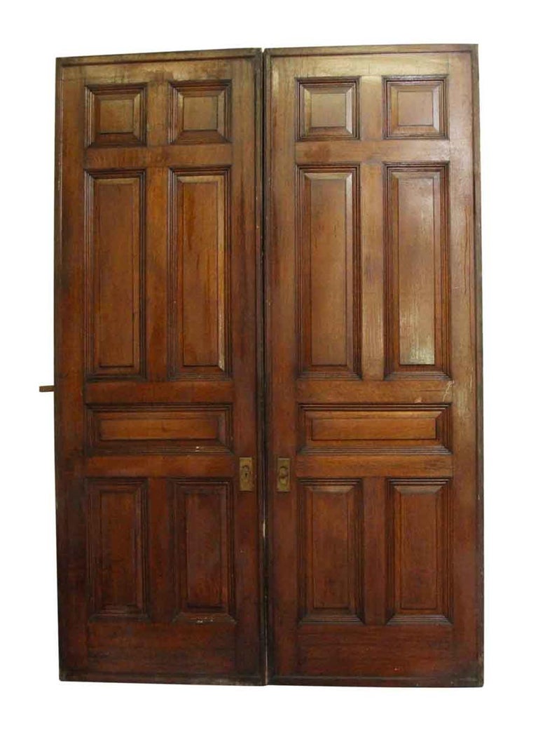 1910 Pair of Wheeled Seven Raised Panel Pocket Quarter Sawn Oak Doors ...
