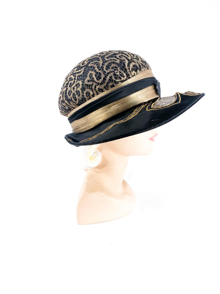 1920s Black Satin Day Cloche with Gold Lamé Accents at 1stDibs