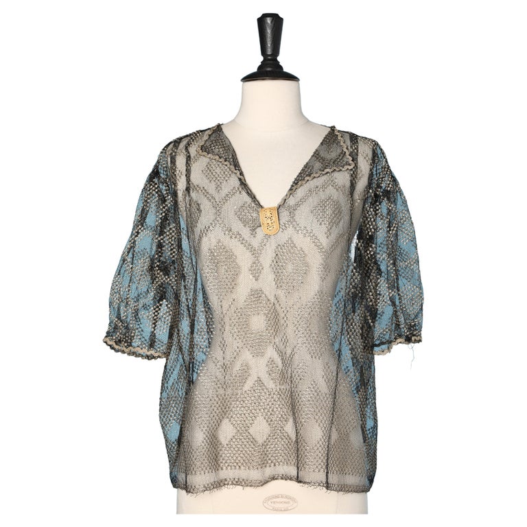 1920's Black tulle top with silver lurex pattern and clip-brooch in the ...