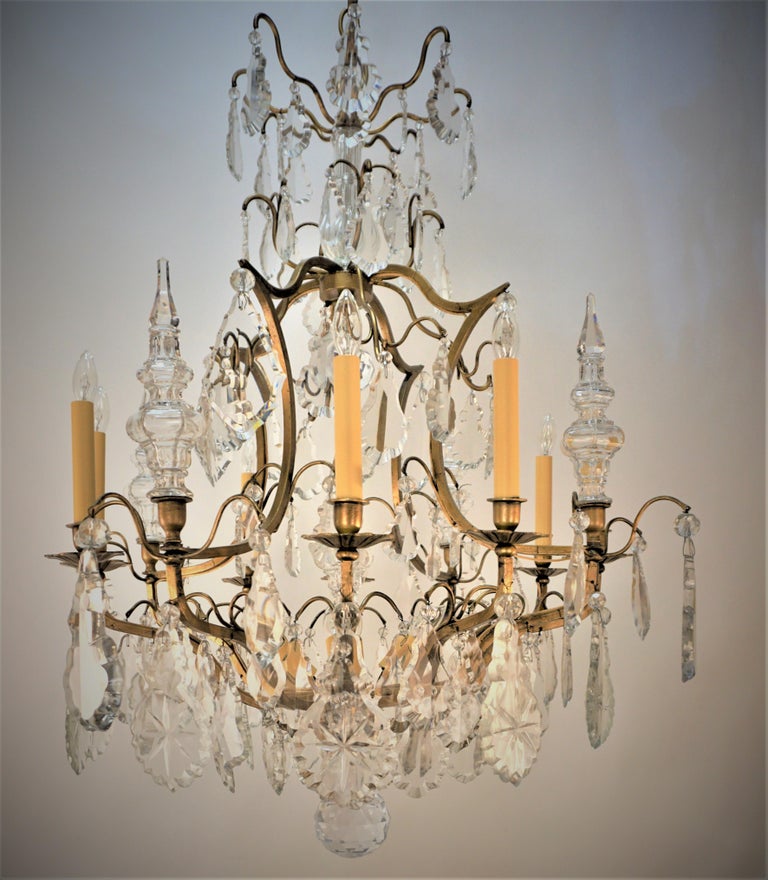 1930s Crystal and Gilt Metal Twelve Light Chandelier For Sale at 1stDibs