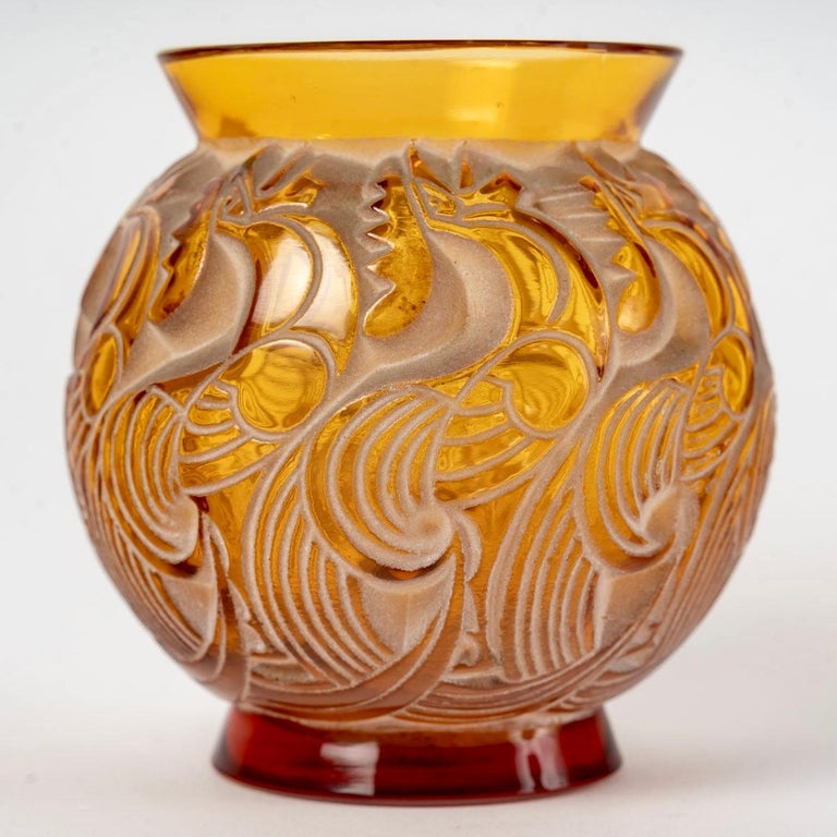 1931 René Lalique, Vase Le Mans Amber Yellow Glass with Beige Patina For Sale at 1stDibs
