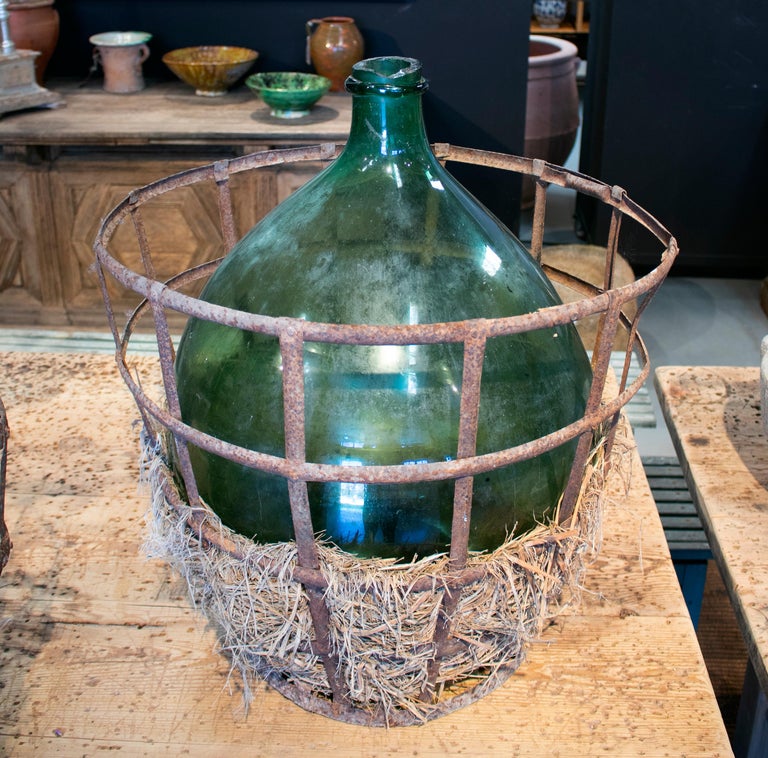 1950s Spanish Glass Blown Wine Demijohn in its Iron Basket Cover at 1stDibs