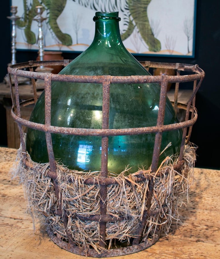 1950s Spanish Glass Blown Wine Demijohn in its Iron Basket Cover at 1stDibs