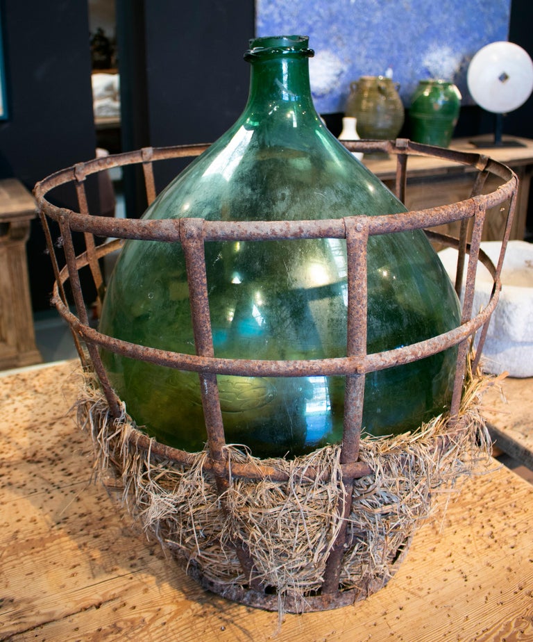 1950s Spanish Glass Blown Wine Demijohn in its Iron Basket Cover at 1stDibs