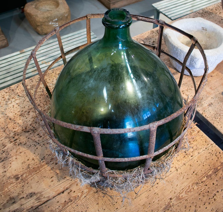 1950s Spanish Glass Blown Wine Demijohn in its Iron Basket Cover at 1stDibs