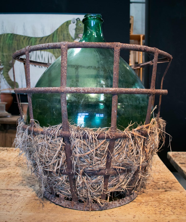 1950s Spanish Glass Blown Wine Demijohn in its Iron Basket Cover at 1stDibs