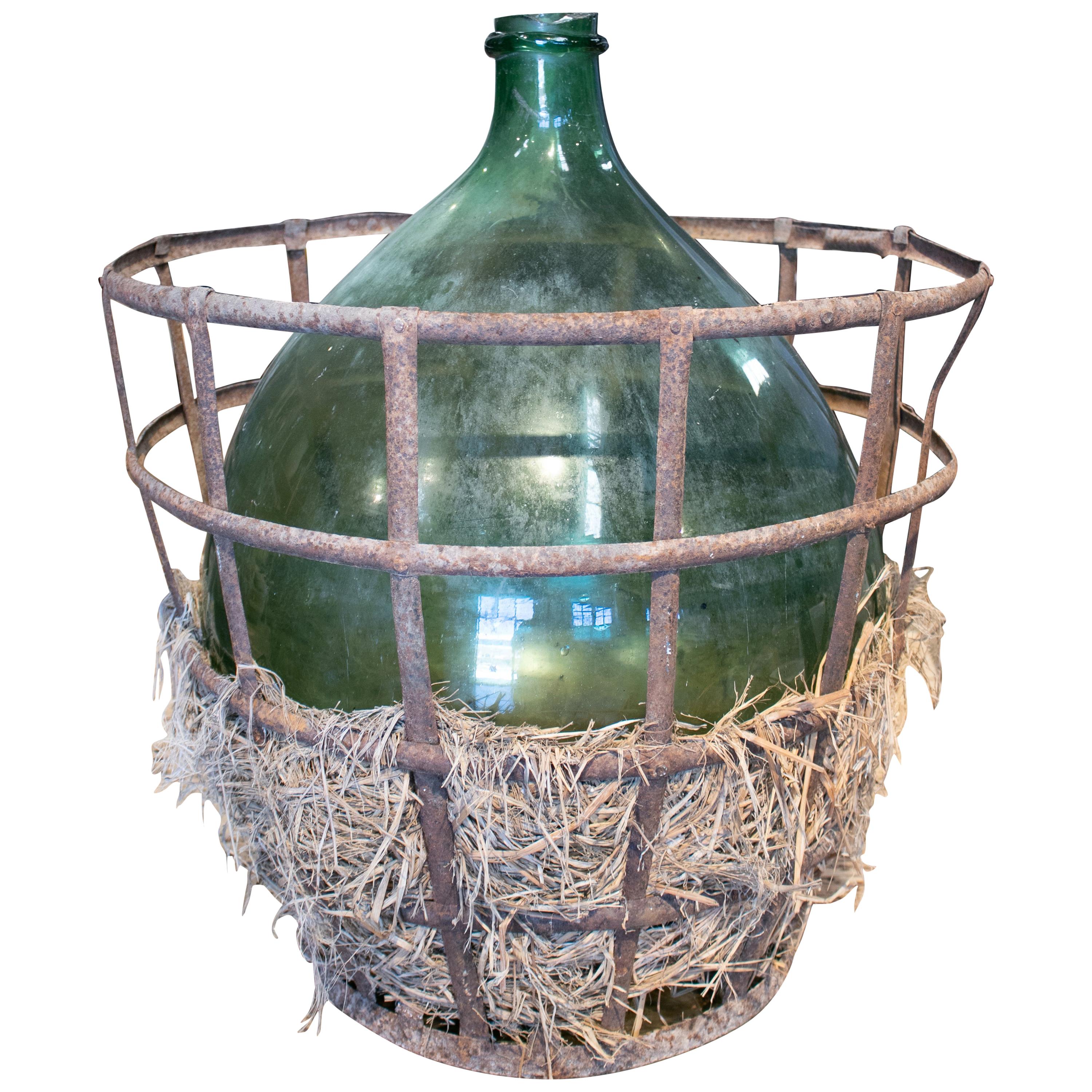 1950s Spanish Glass Blown Wine Demijohn in its Iron Basket Cover at 1stDibs