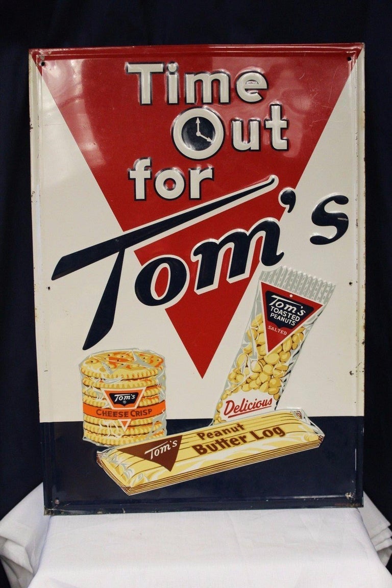 1958 Tom's Toasted Peanuts Embossed Tin Sign For Sale at 1stDibs