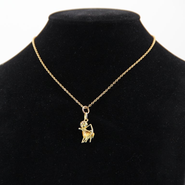 1960s 18 Karat Yellow Gold Enamel Cupid Charm Pendant For Sale at 1stDibs