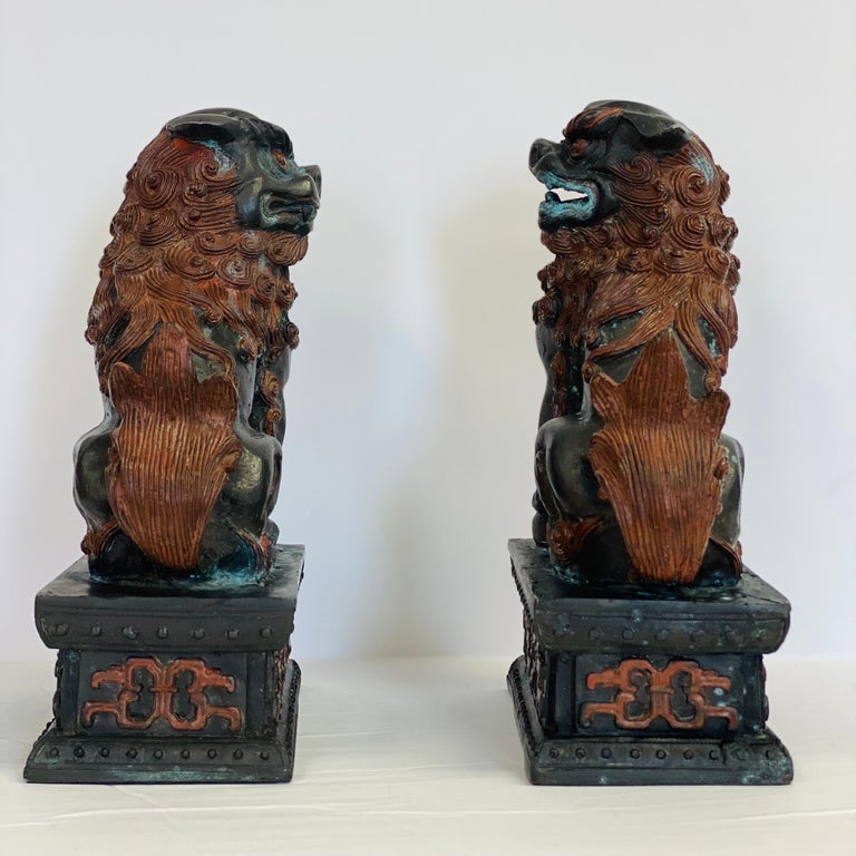 1960s Chinese Metal Cooper Foo Dog Bookends, a Pair For Sale at 1stDibs