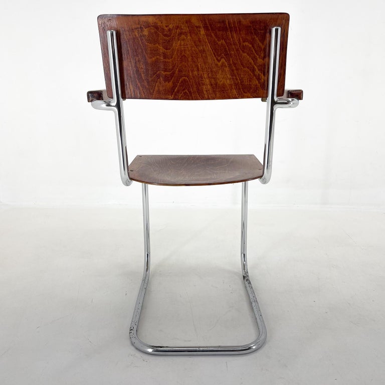 1960's Chrome Tubular Chair with Armrests For Sale at 1stDibs