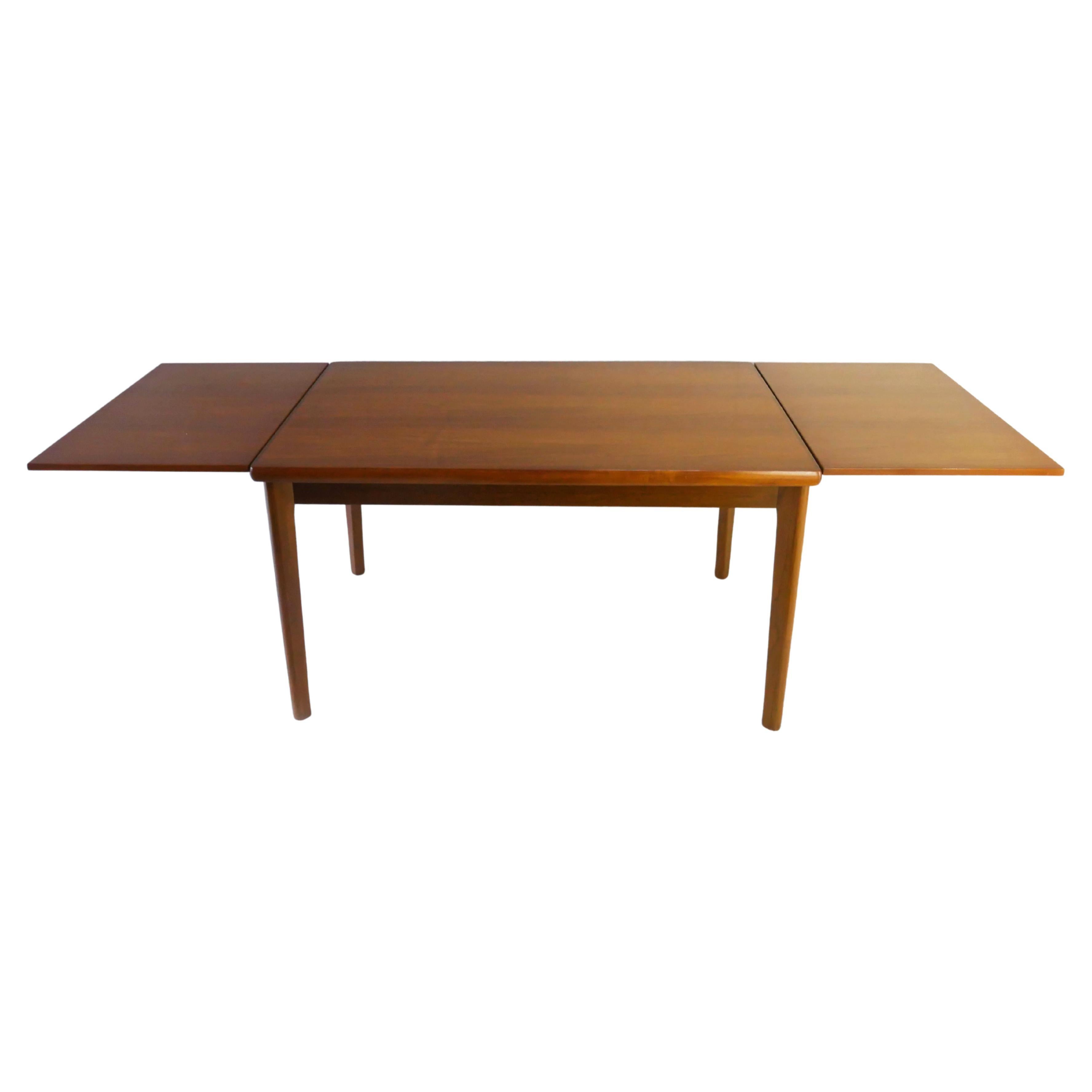 Danish mid century modern rosewood pedestal oval dining table. at 1stDibs