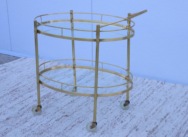 1960's Mid-Century Modern Two Tier Brass Oval Bar Cart For Sale at 1stDibs