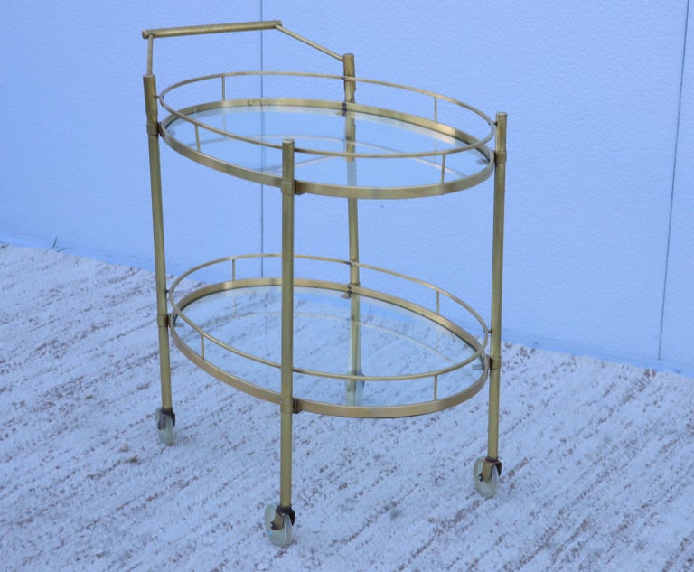 1960's Mid-Century Modern Two Tier Brass Oval Bar Cart For Sale at 1stDibs