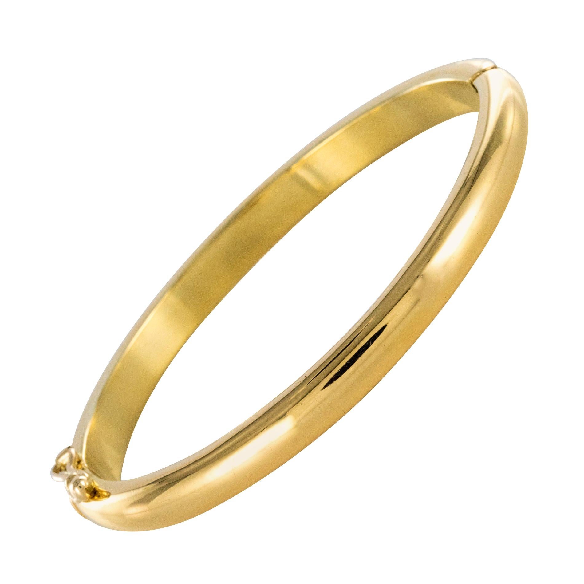1960s Oval 18 Karat Yellow Gold Bangle Bracelet at 1stDibs