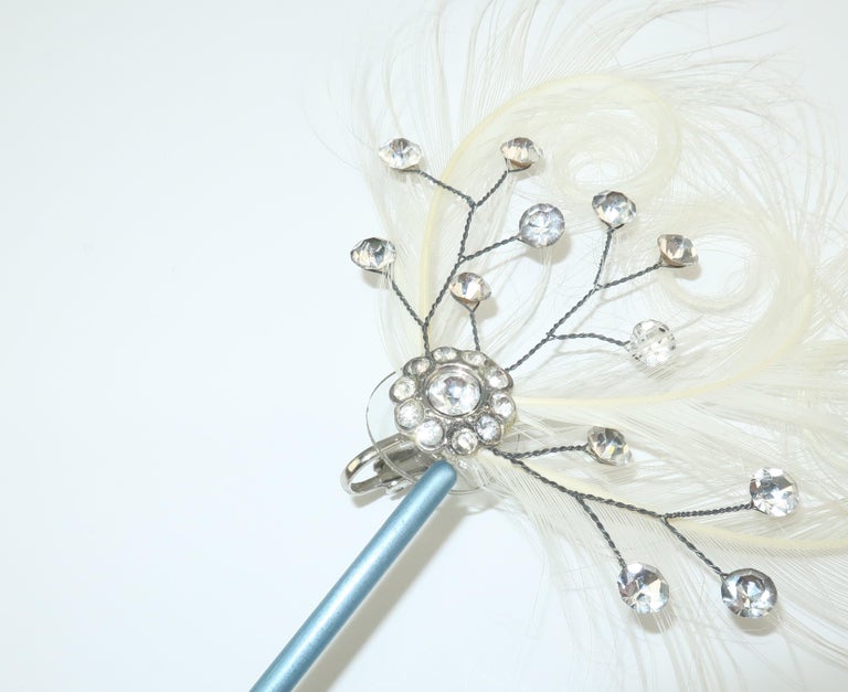 1960's Showgirl Style Feather and Rhinestone Earrings at 1stDibs