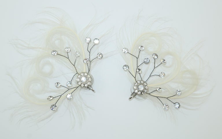 1960's Showgirl Style Feather and Rhinestone Earrings at 1stDibs