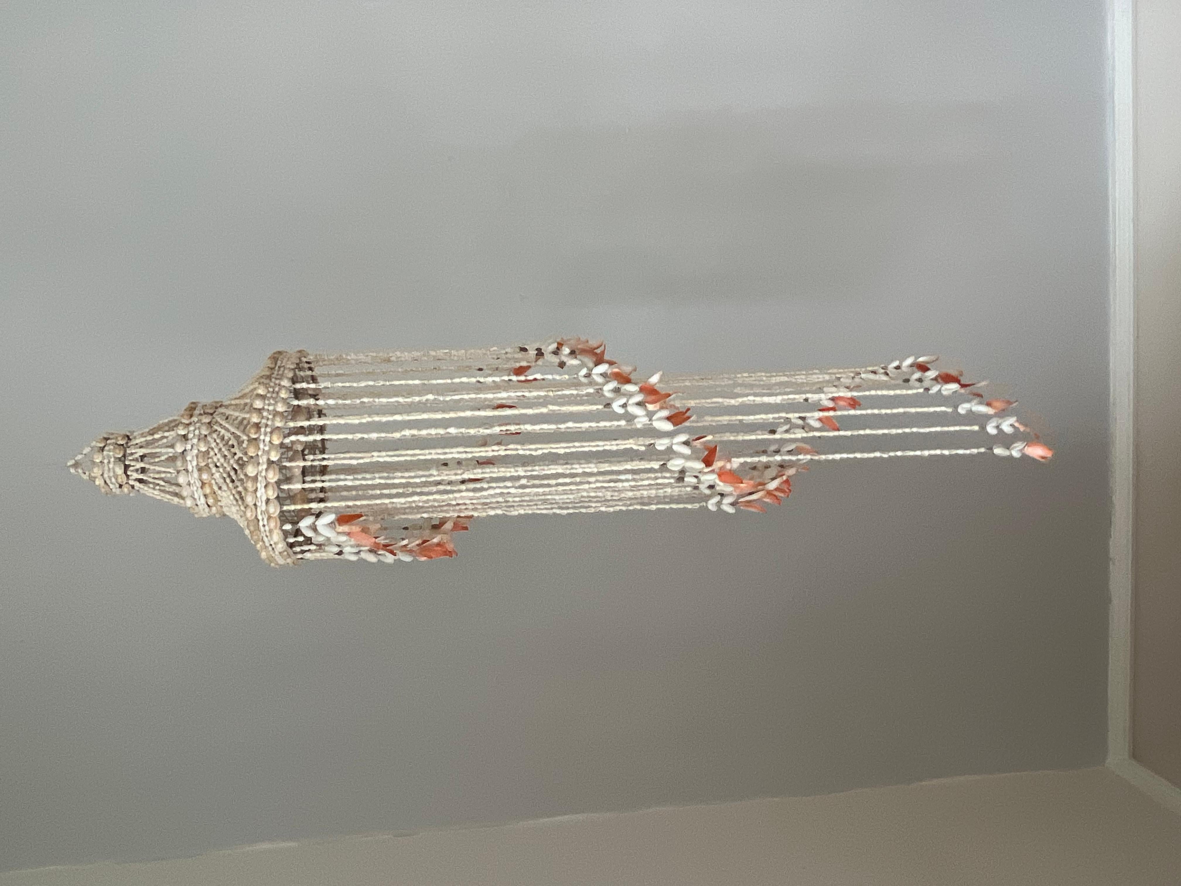 1970/1980s tall chandelier in strings of natural shells For Sale at 1stDibs