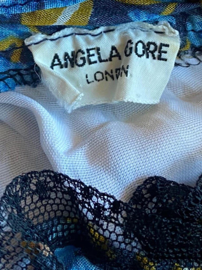 1970s Angela Gore Floral Boho Maxi Dress For Sale at 1stDibs