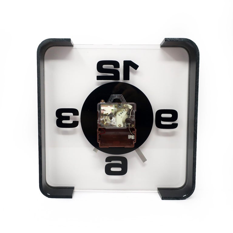 1970s Black Lucite Wall Clock by Empire Art For Sale at 1stDibs