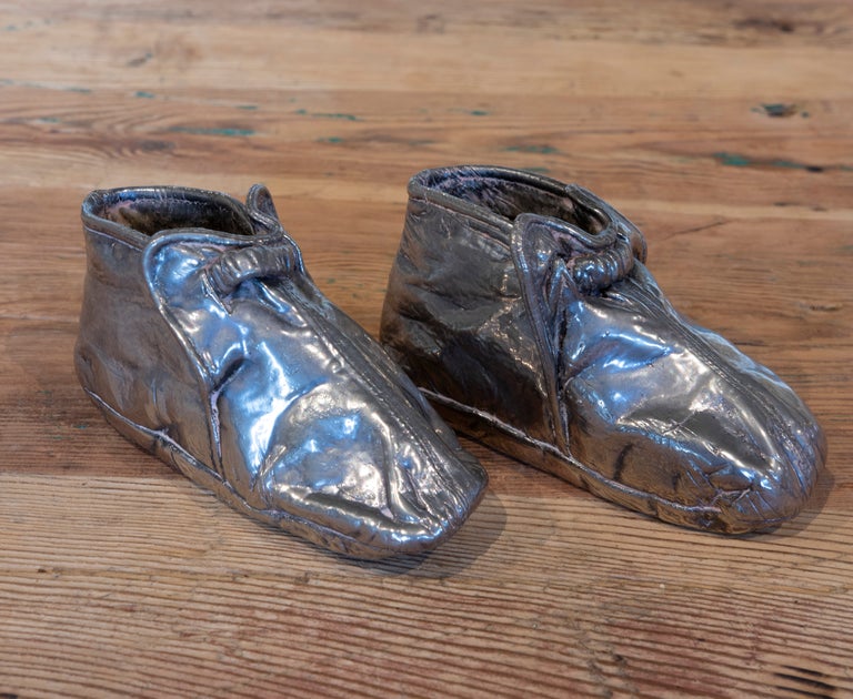 1970s English Pair of Silver Plated Metal Shoes For Sale at 1stDibs