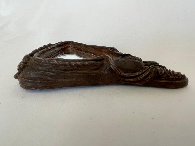 1970's Hand Carved Face Scuplture Resin Mirror For Sale at 1stDibs