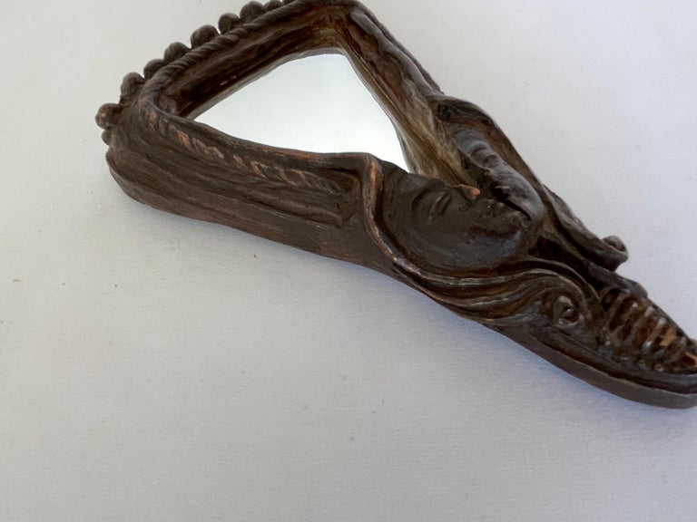 1970's Hand Carved Face Scuplture Resin Mirror For Sale at 1stDibs