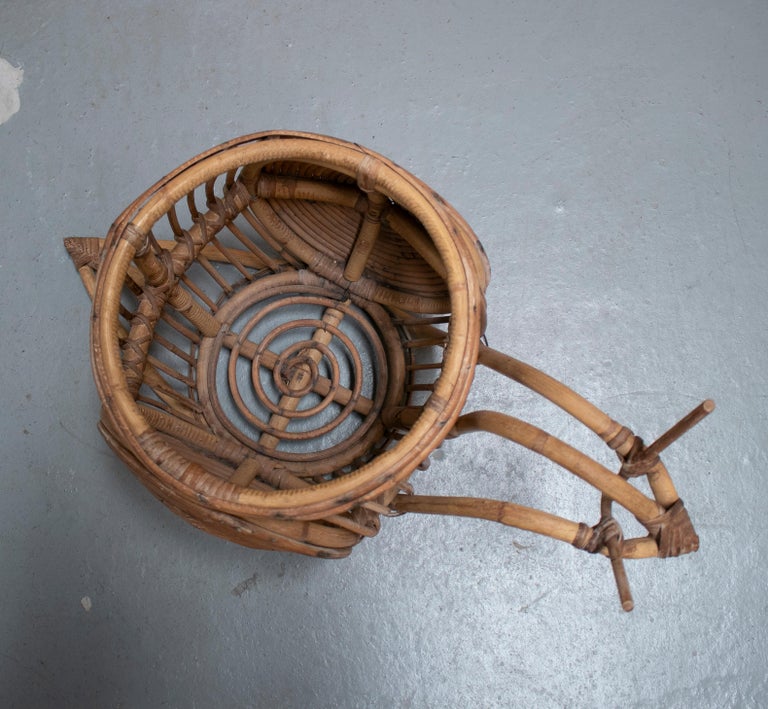 1970s Spanish Snail Shaped Bamboo Magazine Rack For Sale at 1stDibs