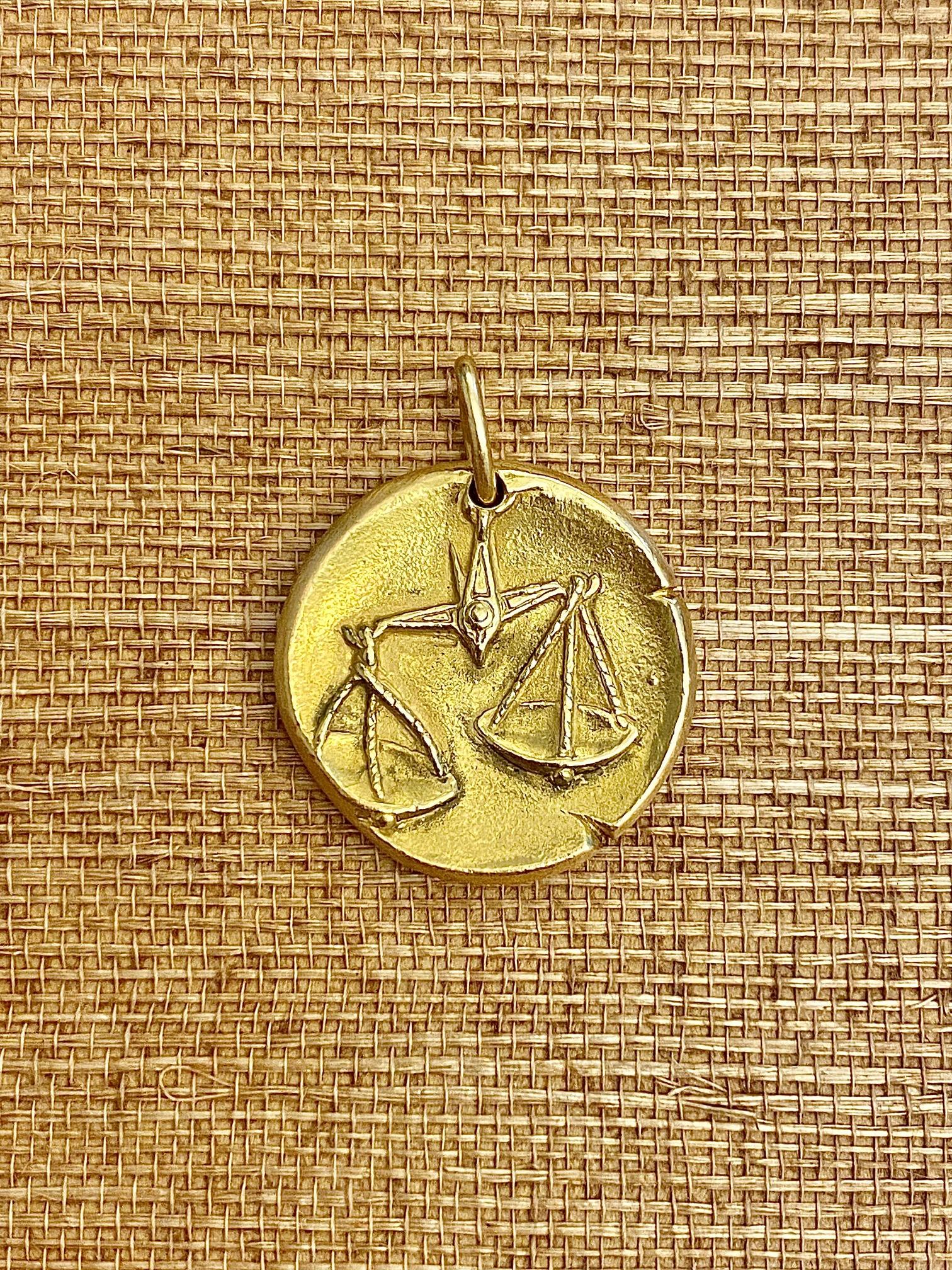 Van Cleef and Arpels 1970s Georges L'Enfant Yellow Gold Libra Zodiac Pendant For Sale at 1stDibs ...