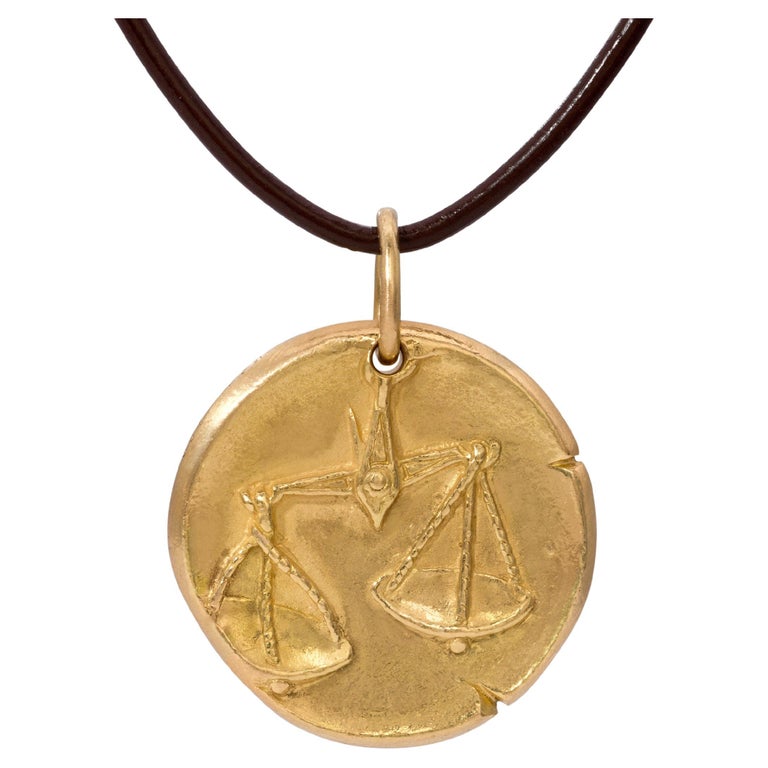 Van Cleef and Arpels 1970s Georges L''Enfant Yellow Gold Libra Zodiac Pendant For Sale at 1stDibs