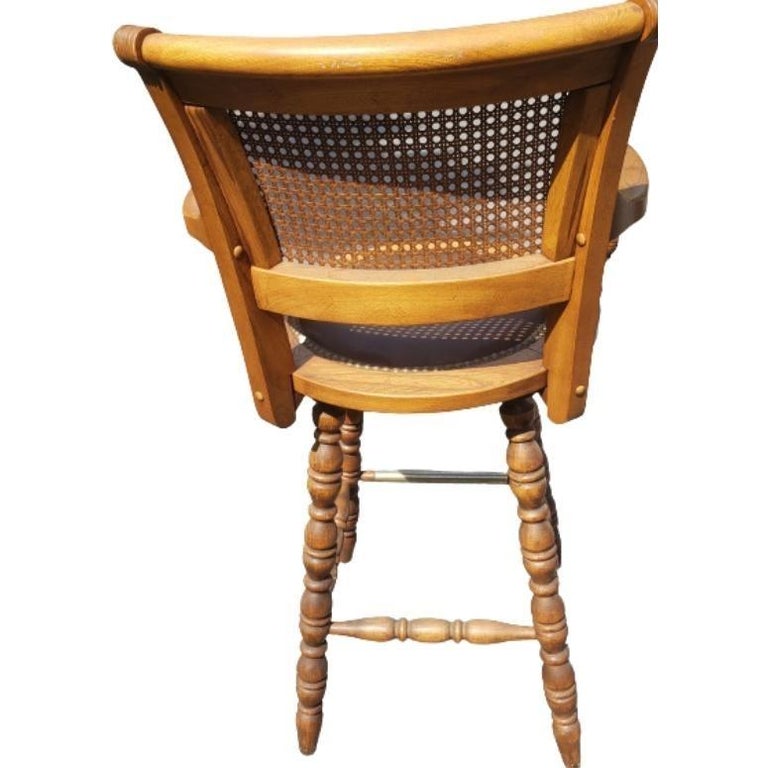 1970s Vintage Full Grain Leather and Caning Swivel Oak Bar Stools, a ...