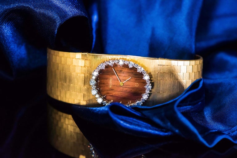 1970s Wide Omega Diamond Teak Wood Dial 18 Karat Yellow Gold Bangle ...