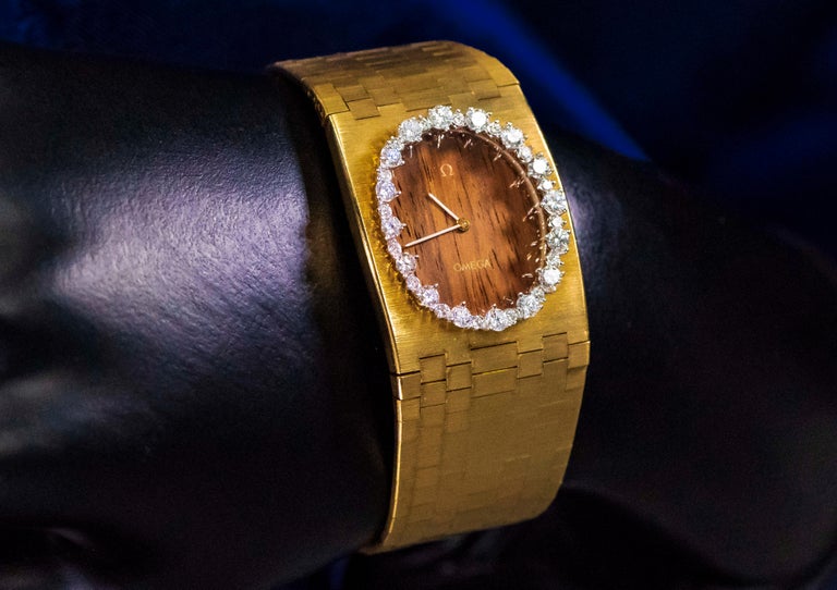 1970s Wide Omega Diamond Teak Wood Dial 18 Karat Yellow Gold Bangle ...